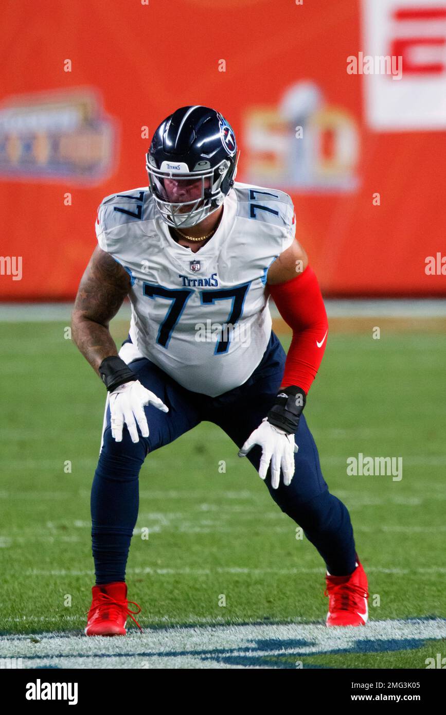 Tennessee Titans offensive tackle Taylor Lewan (77) lines up against ...