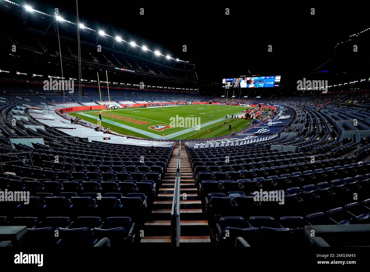 The Tennessee Titans and the Denver Broncos compete during the first ...