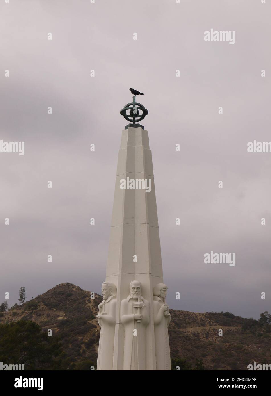 A crow perches on top of the Armillary Sphere, Astronomers Monument ...
