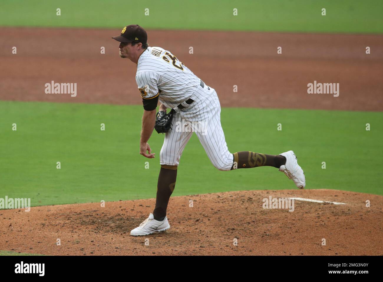 San Diego Padres relief pitcher Tim Hill follows through after a pitch ...