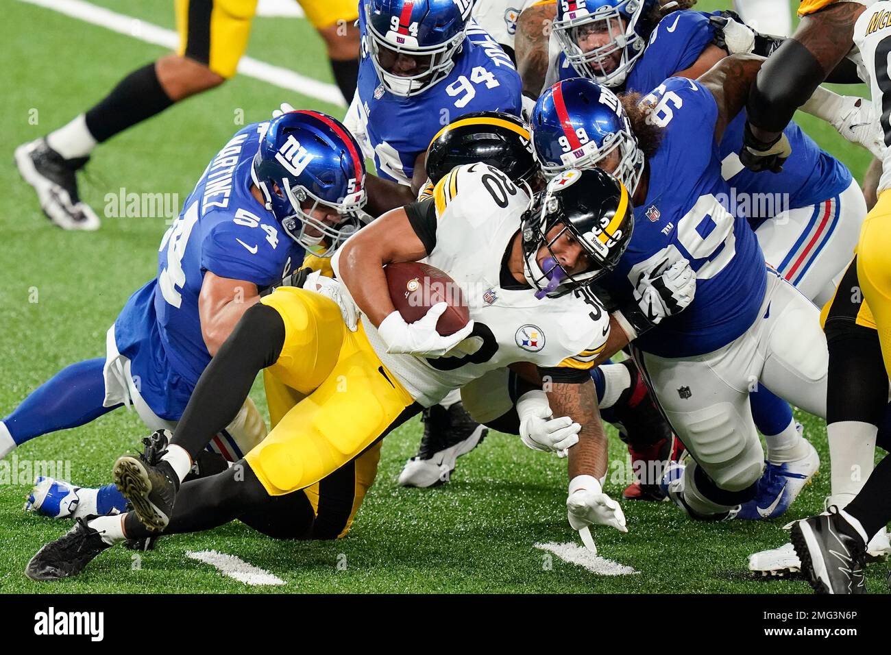 Pittsburgh Steelers running back James Conner (30) is tackled by the ...
