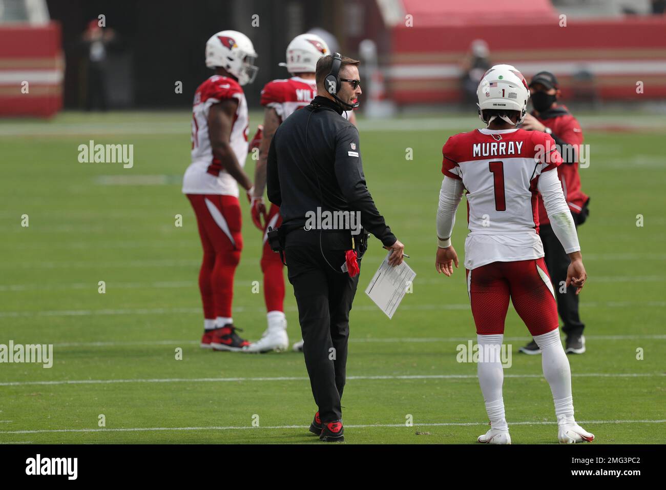 Arizona Cardinals head coach Kliff Kingsbury talks with quarterback ...