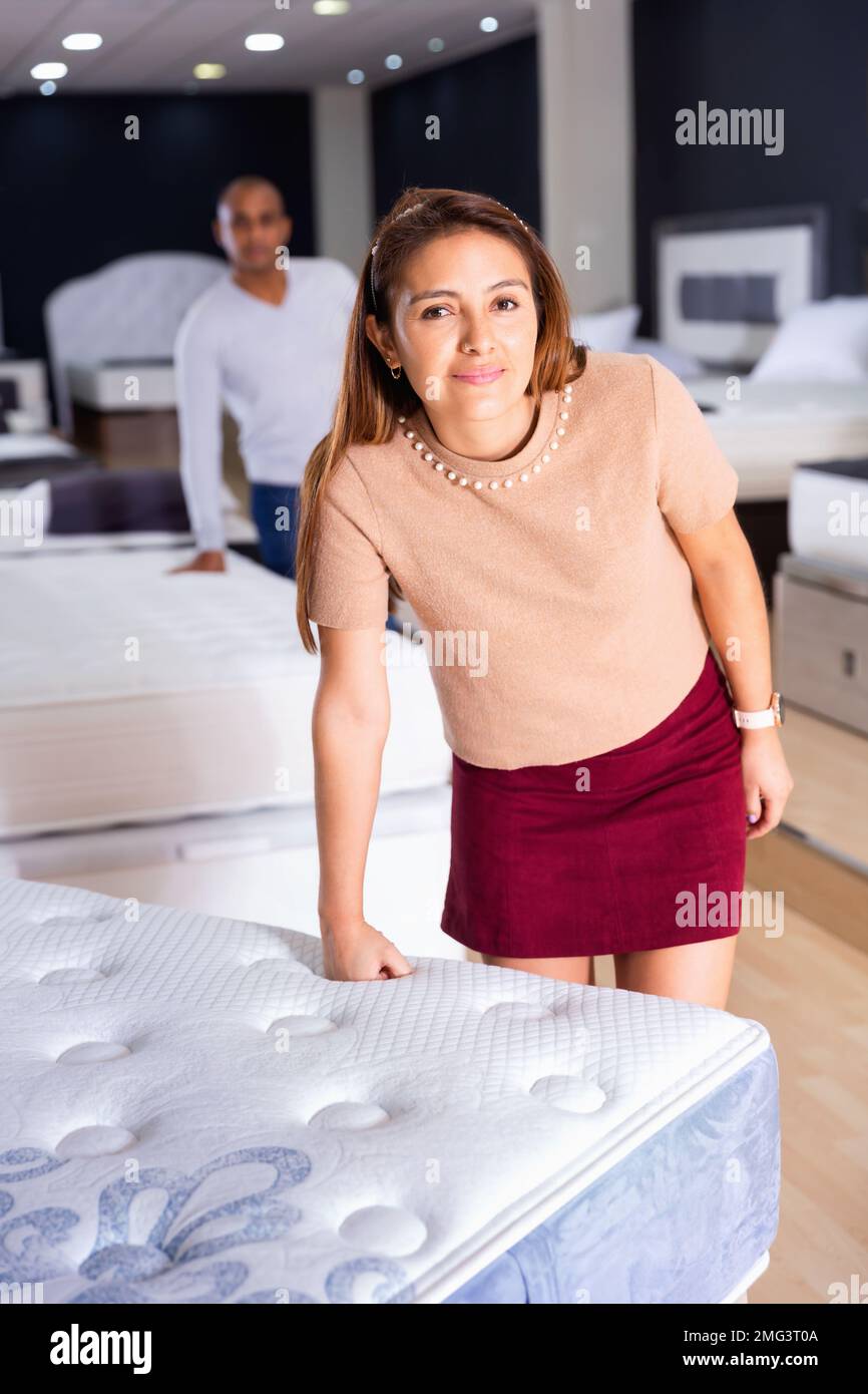 Portrait of young attractive Latina looking for new modern orthopedic ...