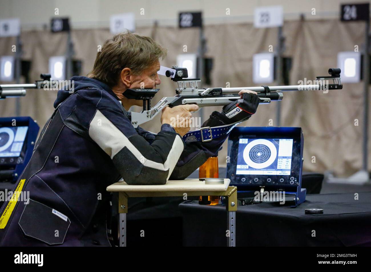 Retired U.S. Army Retired Col. Lyle Ourada takes aim at his target ...