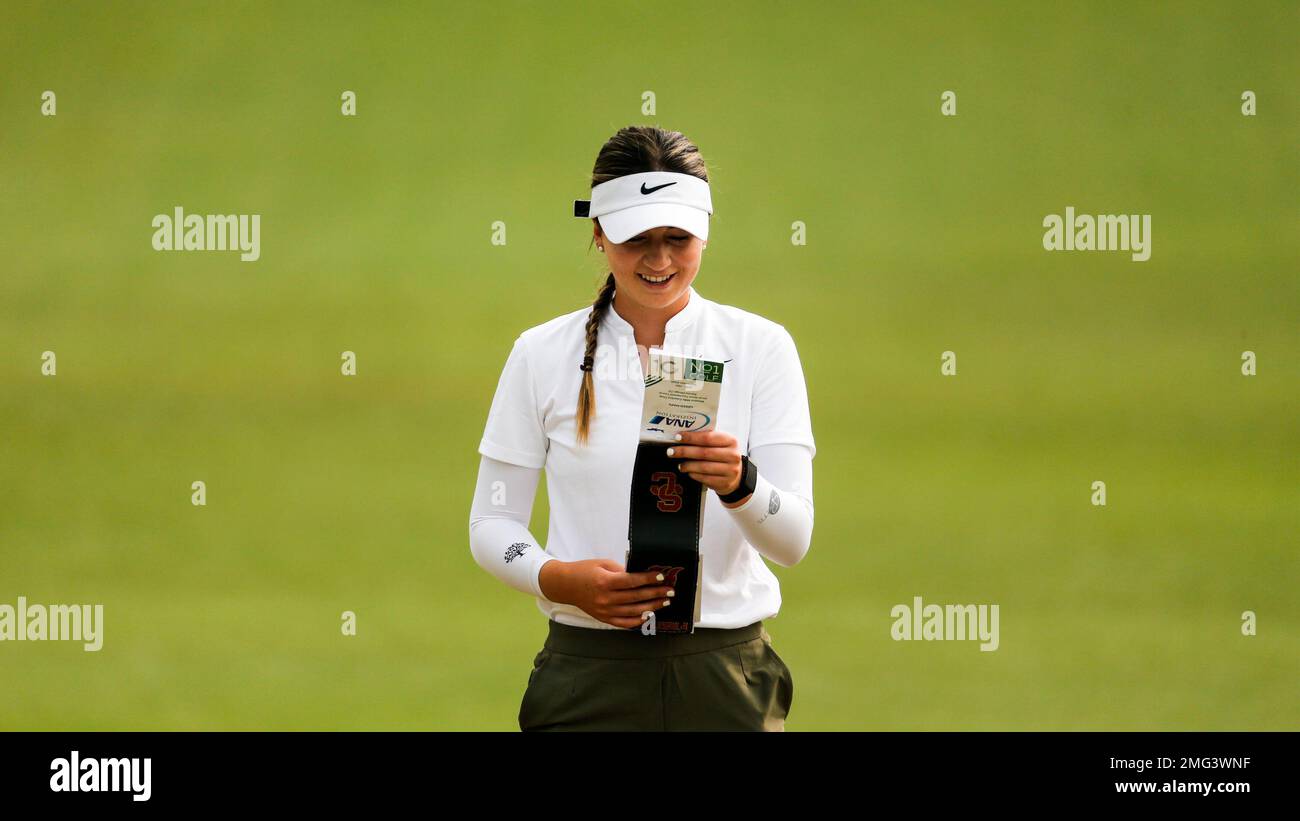 Gabriela Ruffels reads her notebook on the first hole during the third ...