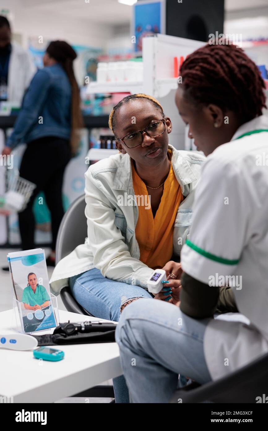 Pharmacist consultation patient pulse hi-res stock photography and ...