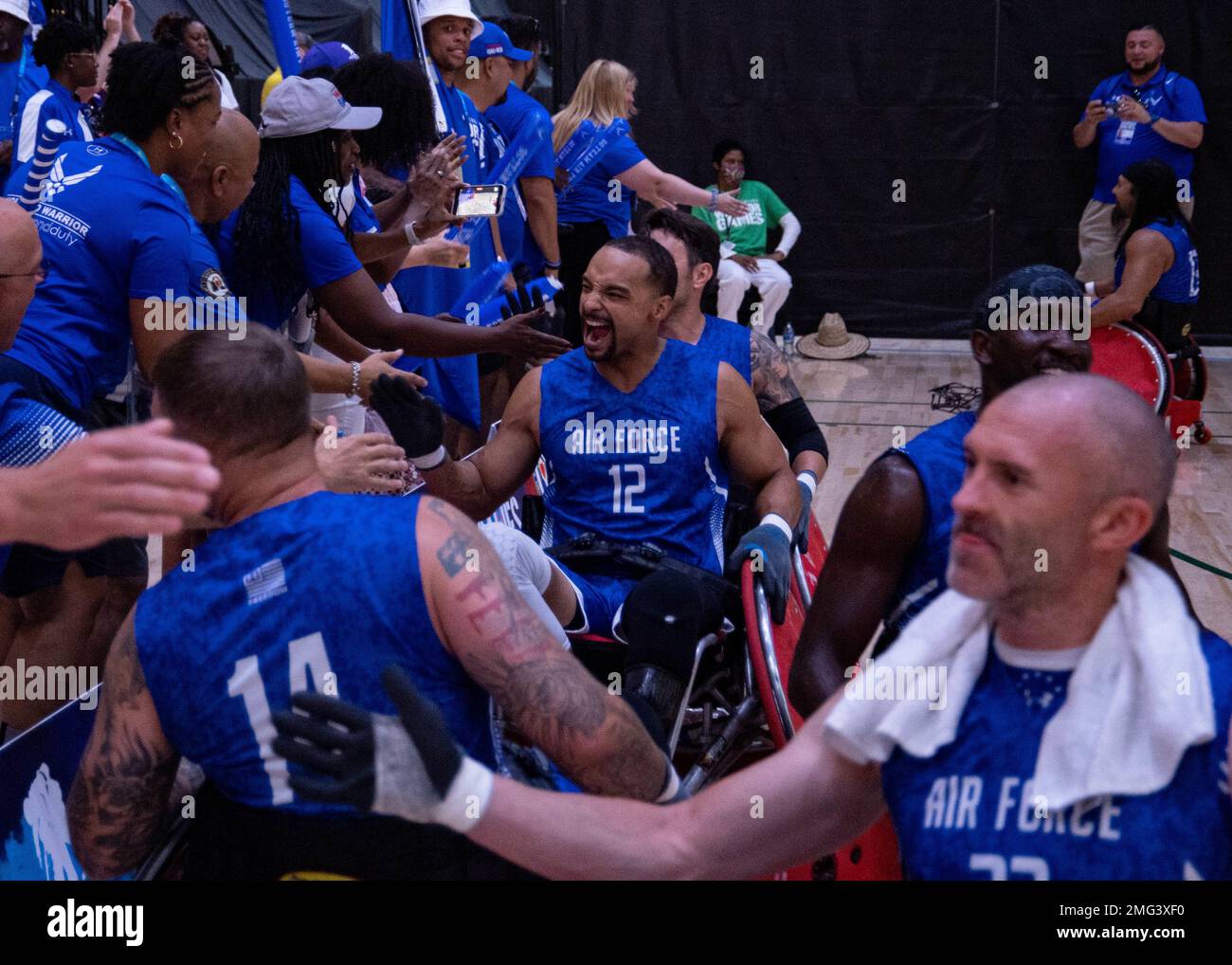 Team Air Force wheelchair rugby athletes high five family, friends and ...
