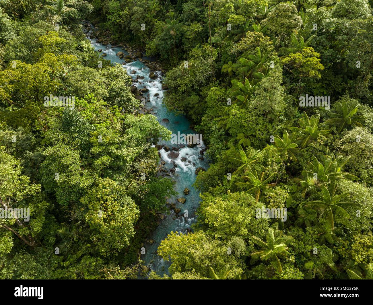 Aerial view of the Rio Celeste (sky blue river) at Tenorio Volcano ...