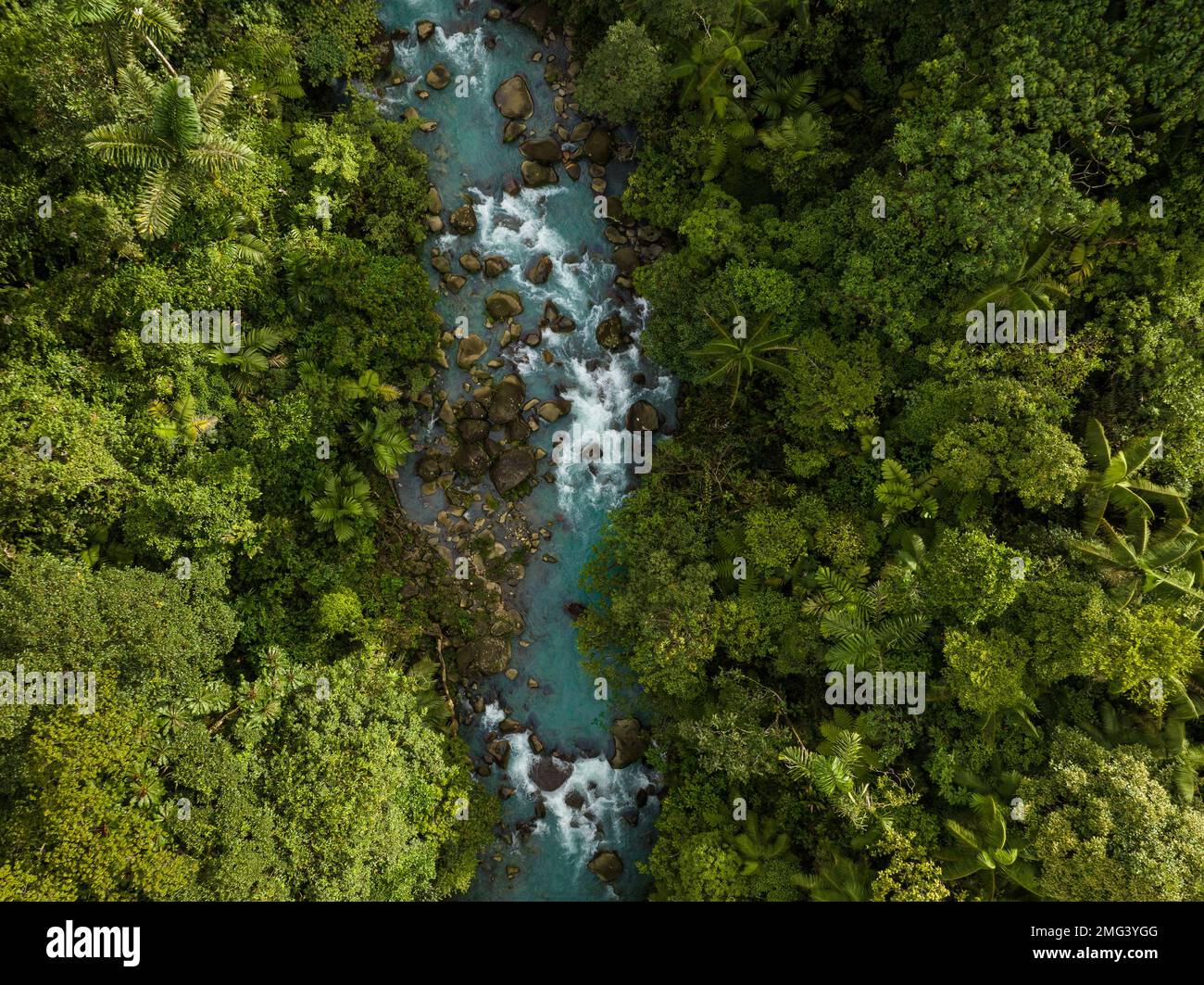 Aerial view of the Rio Celeste (sky blue river) at Tenorio Volcano ...