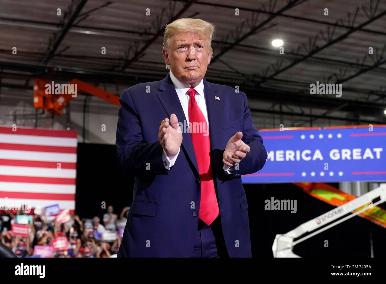 President Donald Trump arrives to speak at a rally at Xtreme ...