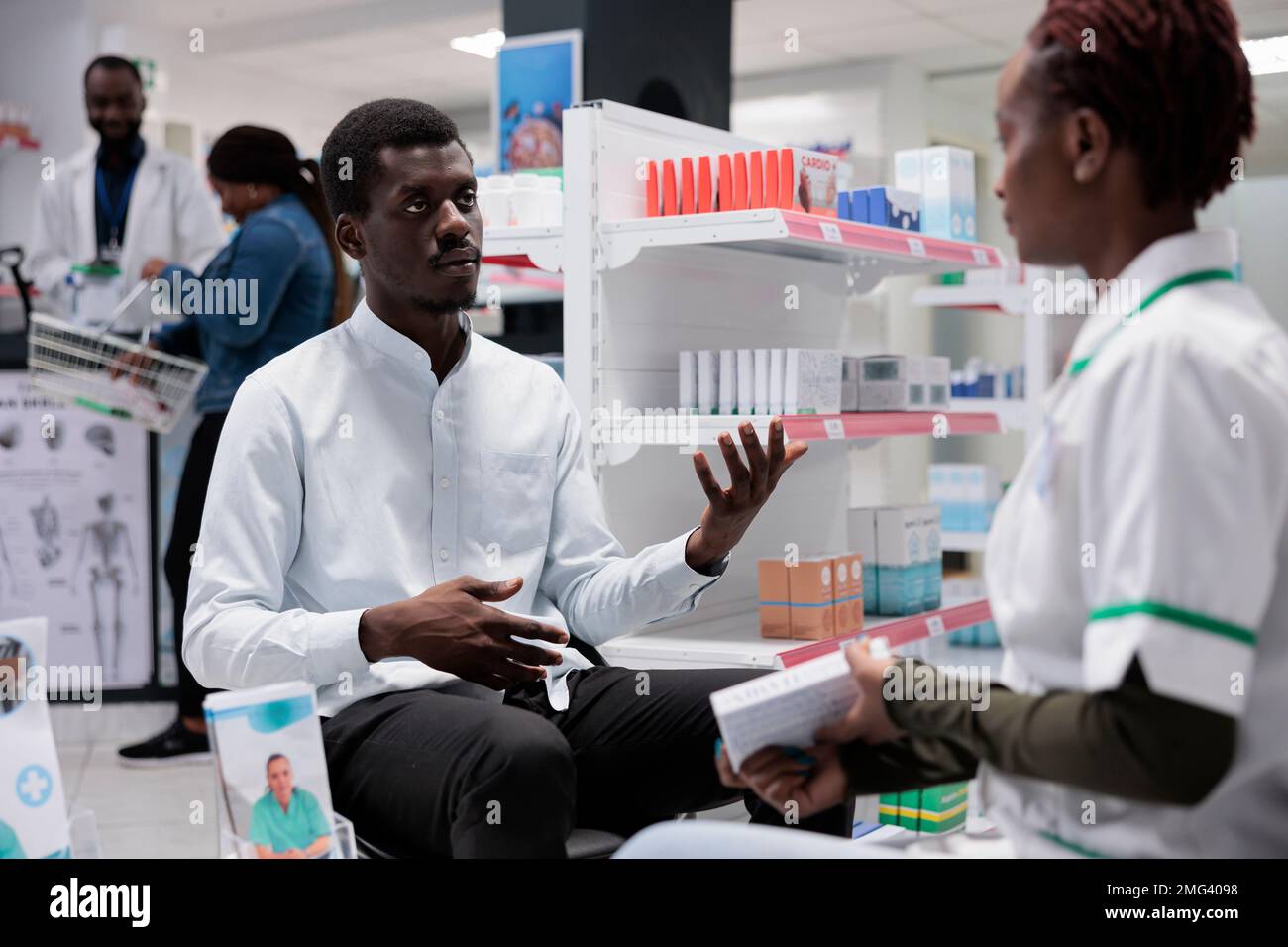 Pharmacist consultation, drugstore seller and customer talking, medic ...