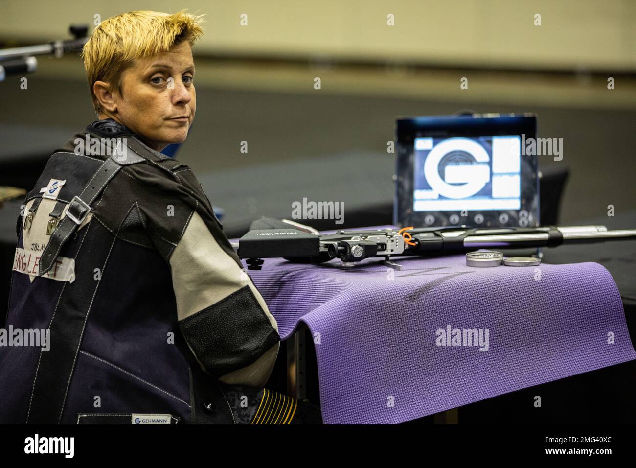 U.S. Army Staff Sgt. Stacy Englert looks toward her teammates during ...