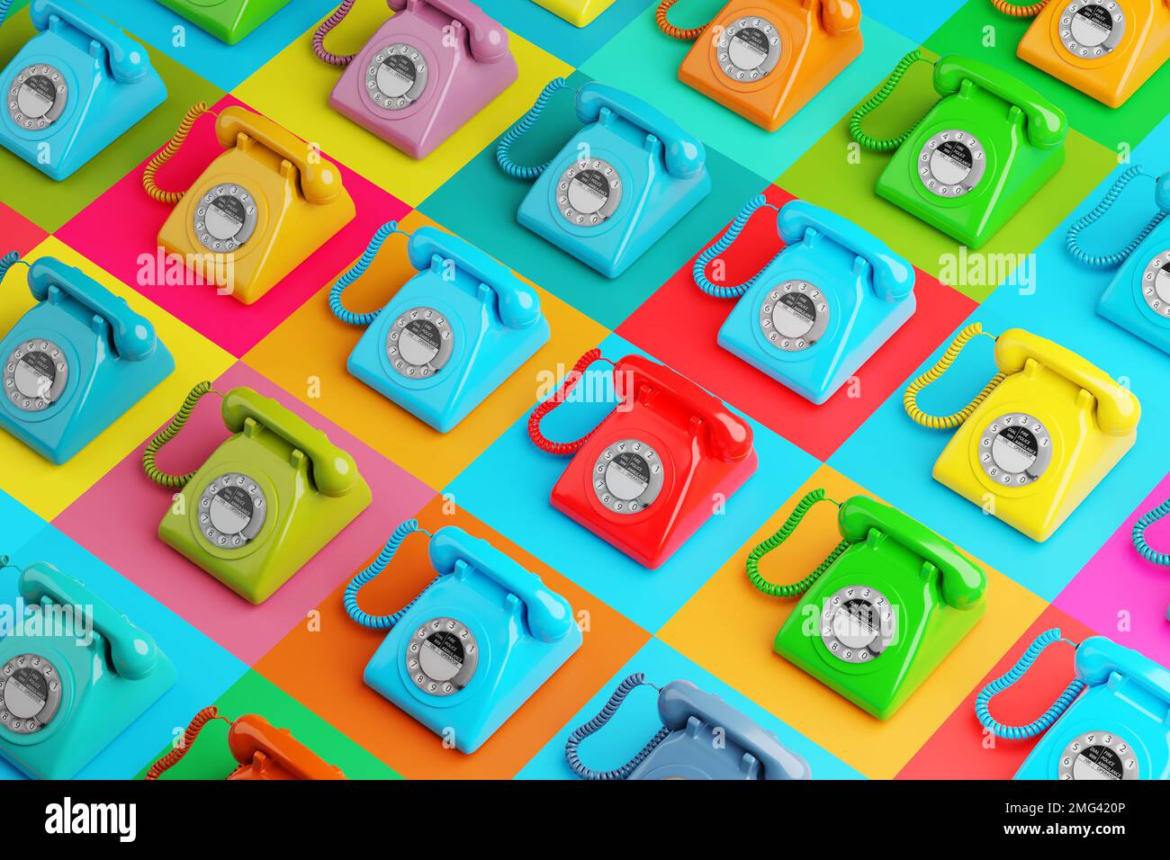 Array of retro rotary telephones in saturated colours on high colour ...