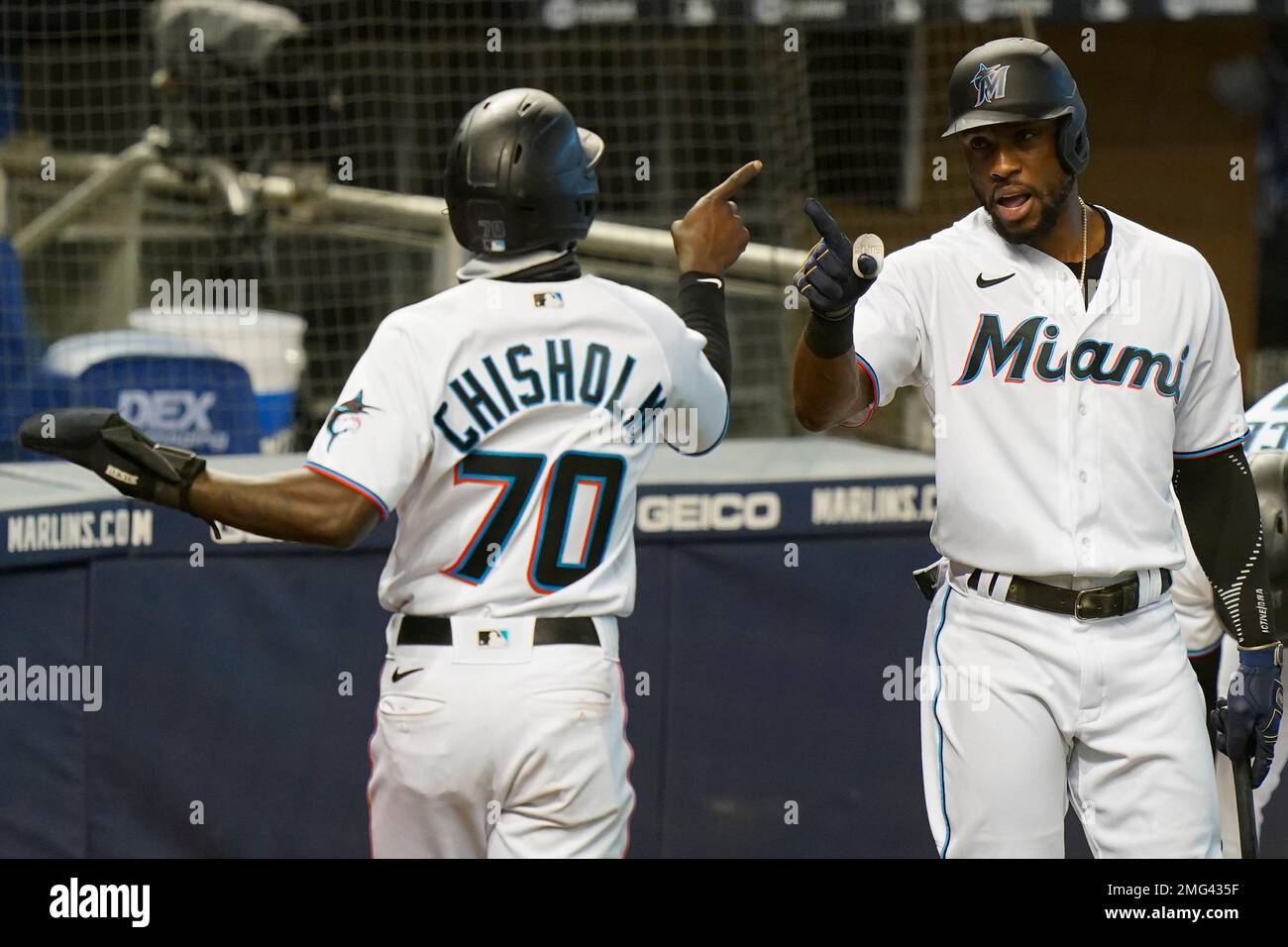 Miami Marlins' Jazz Chisholm (70) is congratulated by Starling Marte ...
