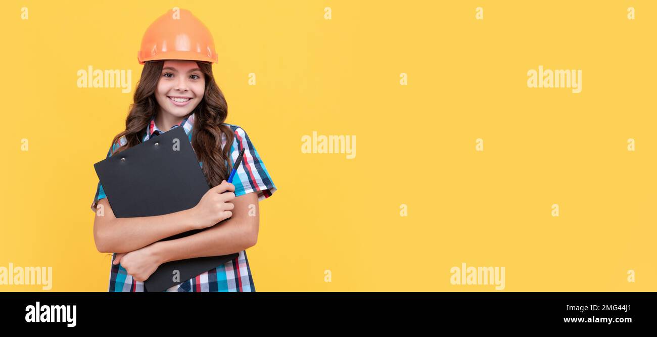 Engineer teenager girl. happy teen girl in construction helmet hold in ...