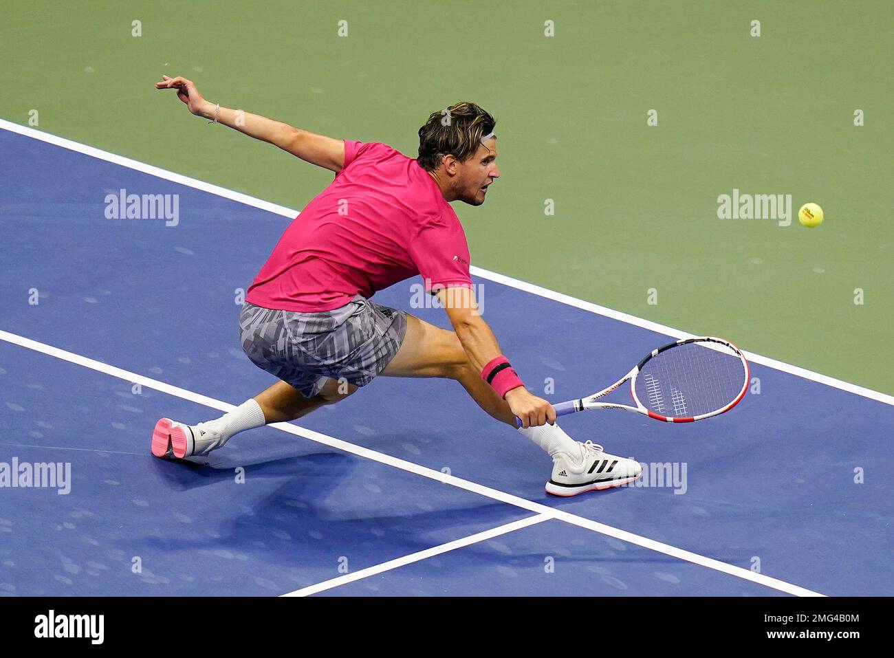 Dominic Thiem, of Austria, returns a shot to Daniil Medvedev, of Russia ...