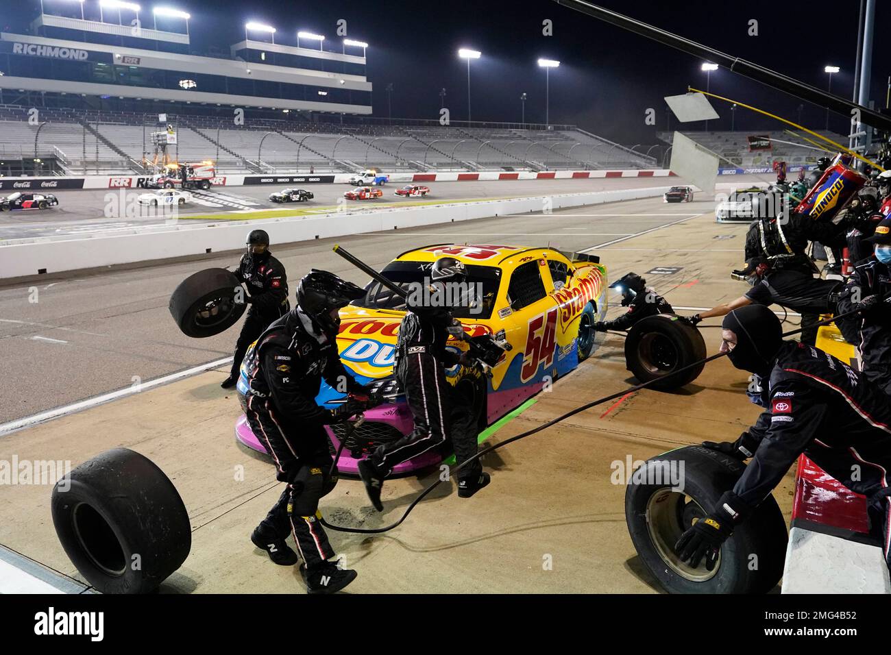 Kyle Busch makes a pit stop during the NASCAR Xfinity Series auto race ...