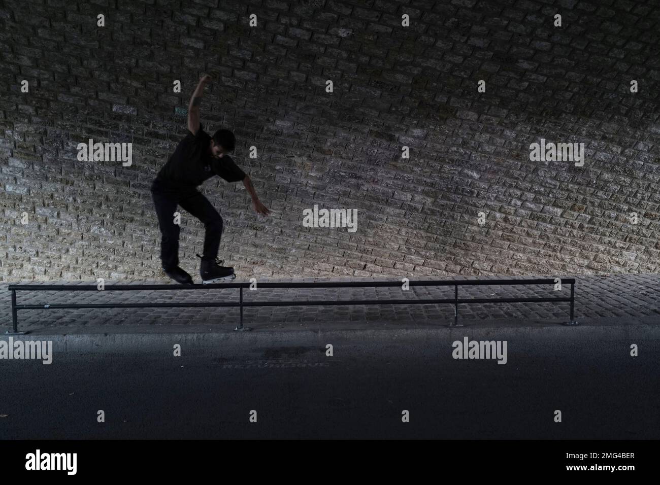A man jumps with roller blades along the Seine river bank in Paris ...