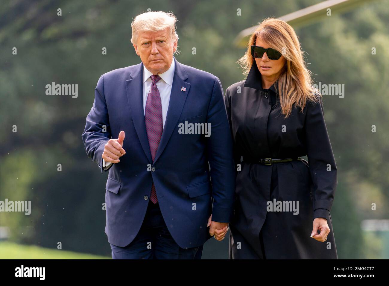President Donald Trump and first lady Melania Trump arrive on the South ...