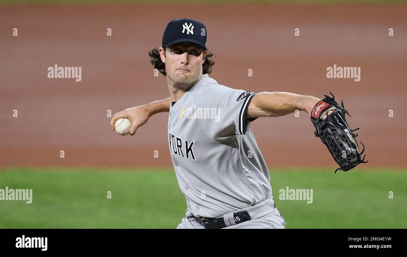 New York Yankees starting pitcher Gerrit Cole delivers a pitch during a ...