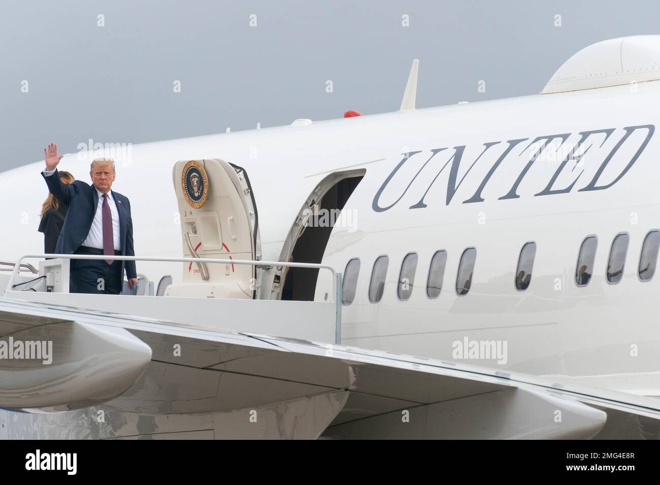 President Donald Trump and first lady Melania Trump board Air Force One ...