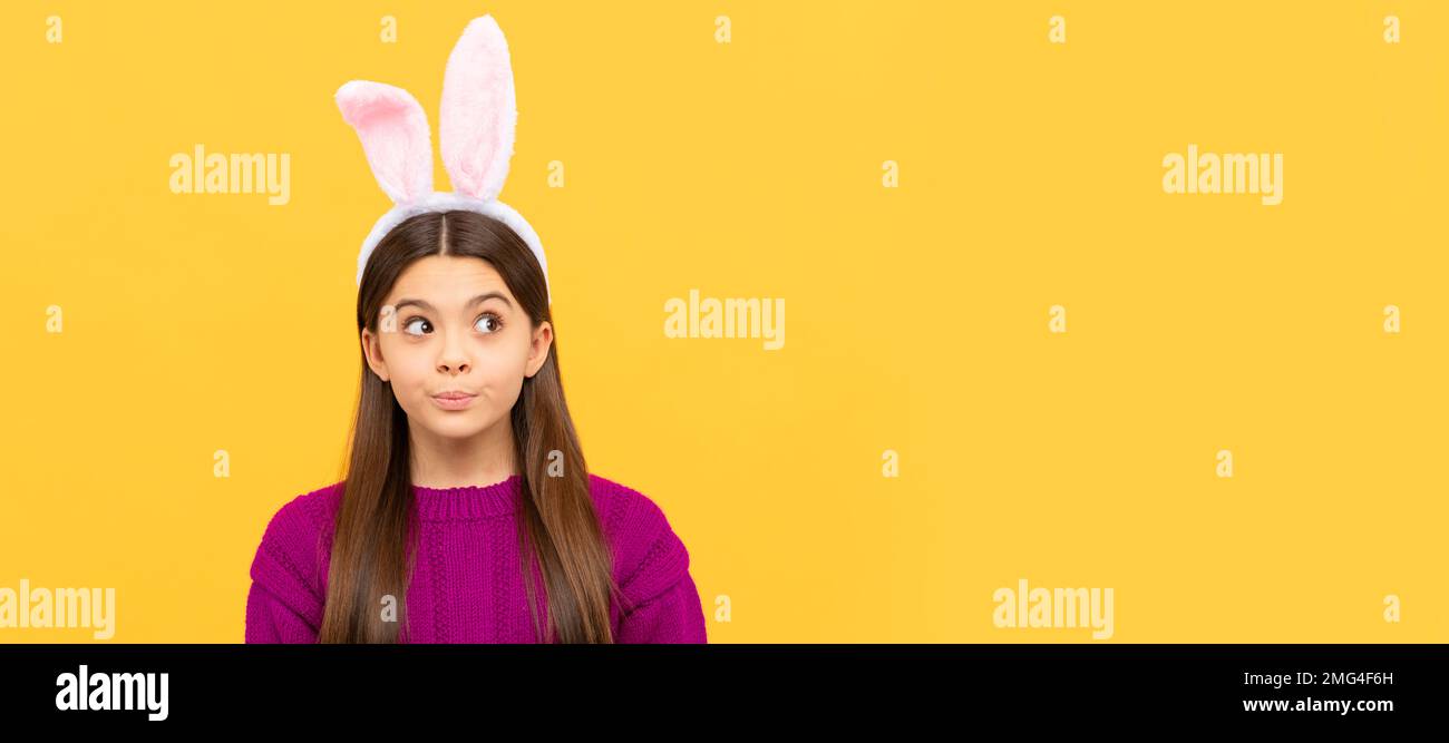 thoughtful teen child in easter bunny ears, easter holiday. Easter ...