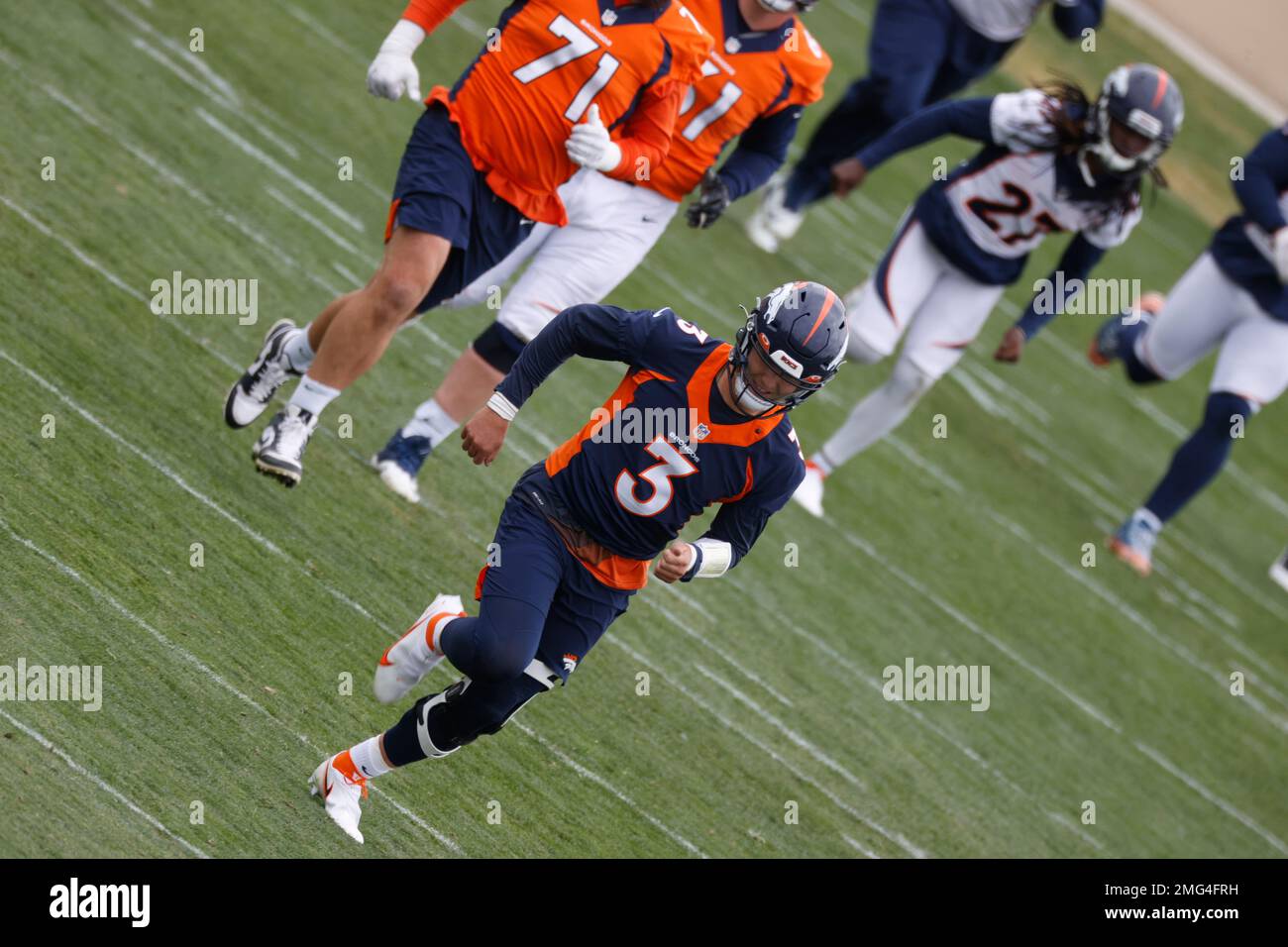 Denver Broncos quarterback Drew Lock (3) takes part in drills during an ...
