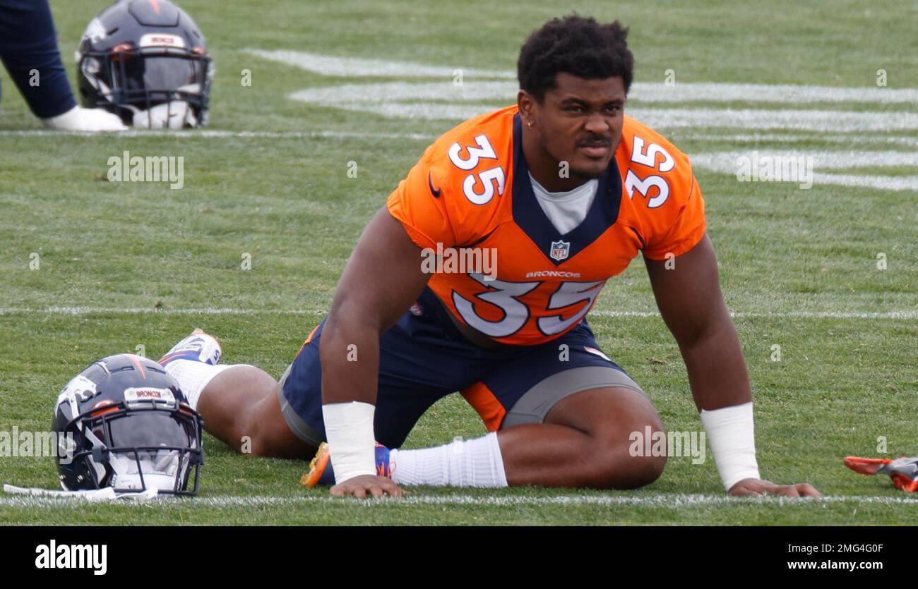 Denver Broncos running back Jeremy Cox takes part in drills during an ...