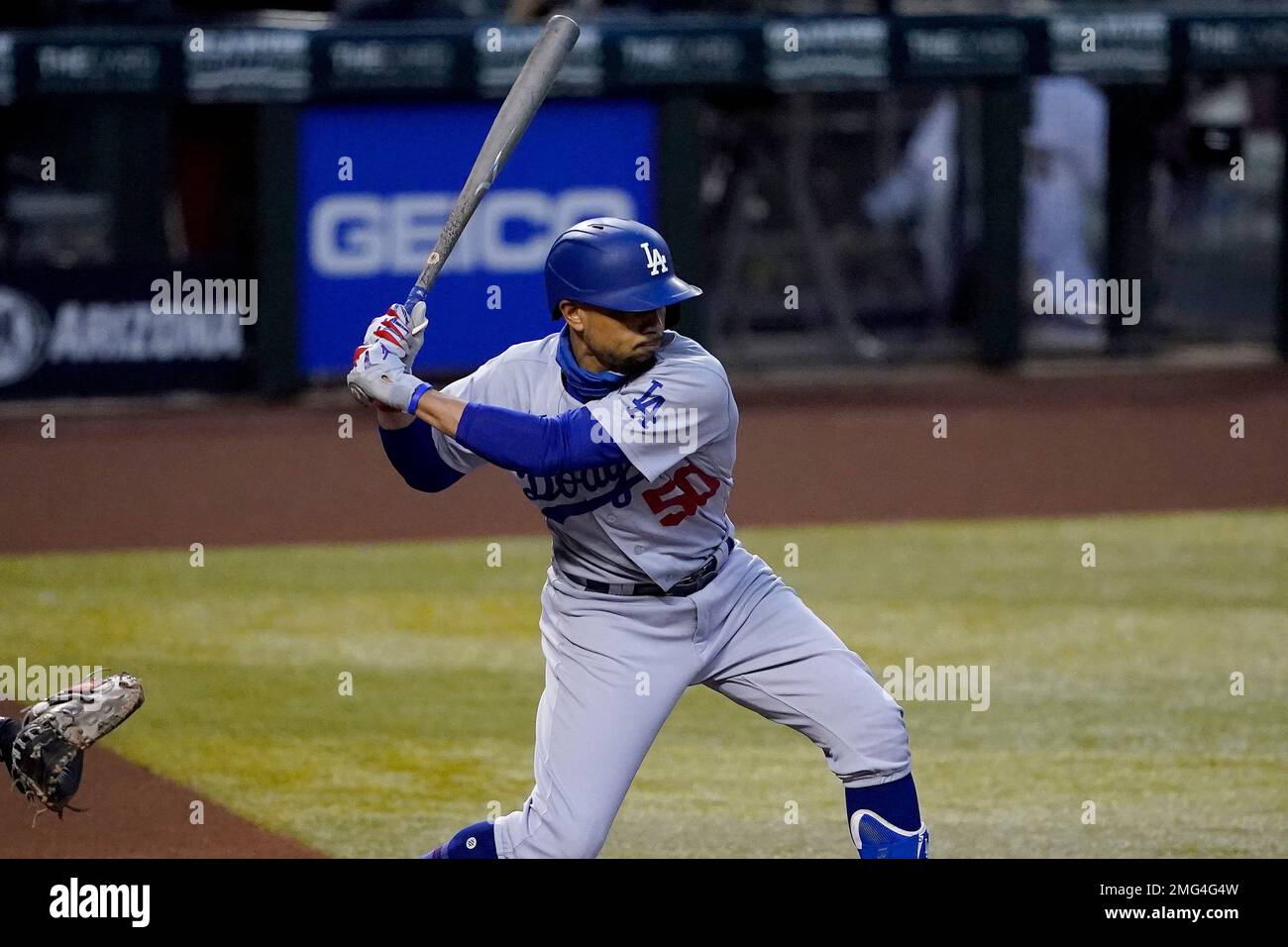 Los Angeles Dodgers' Mookie Betts hits against the Arizona Diamondbacks ...