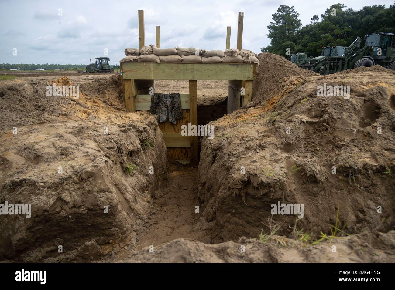 An entrenched guard hut stands after being erected by U.S. Marines with ...