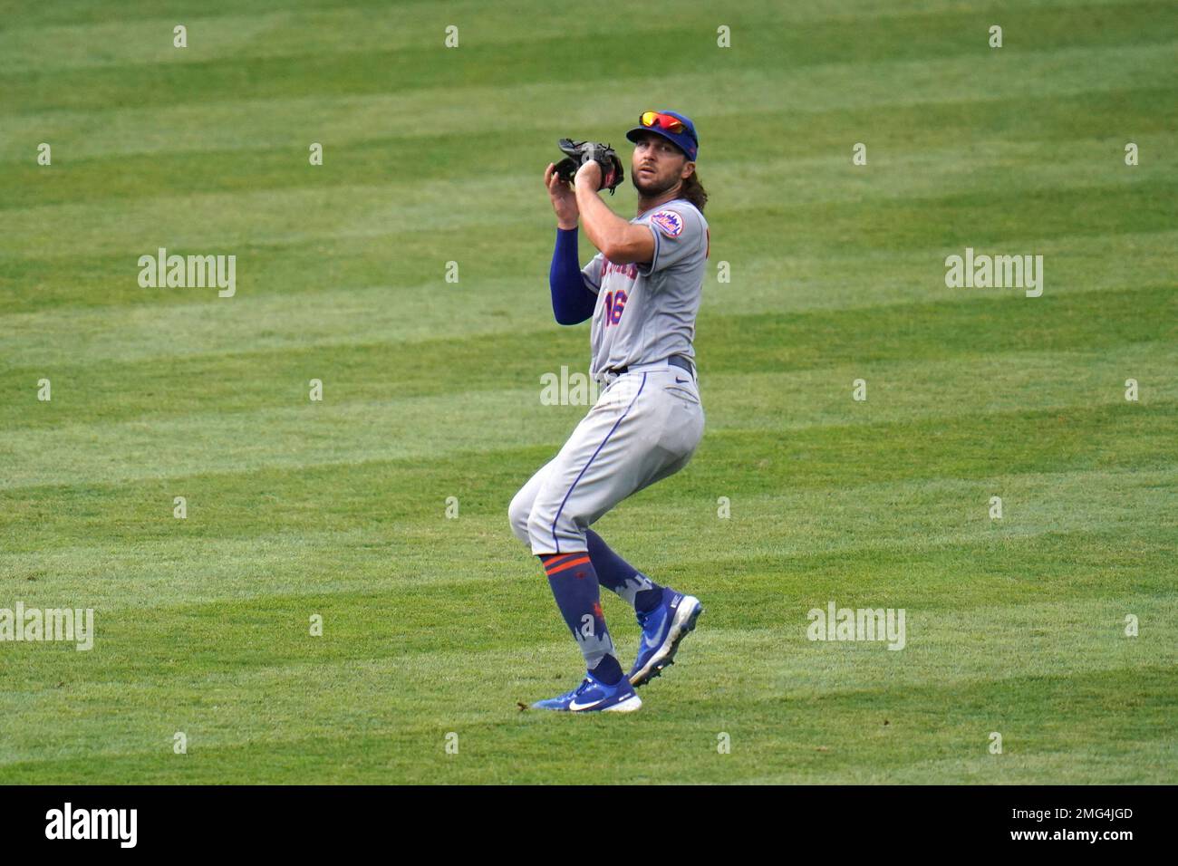 New York Mets center fielder Jake Marisnick makes a catch on a ball hit ...