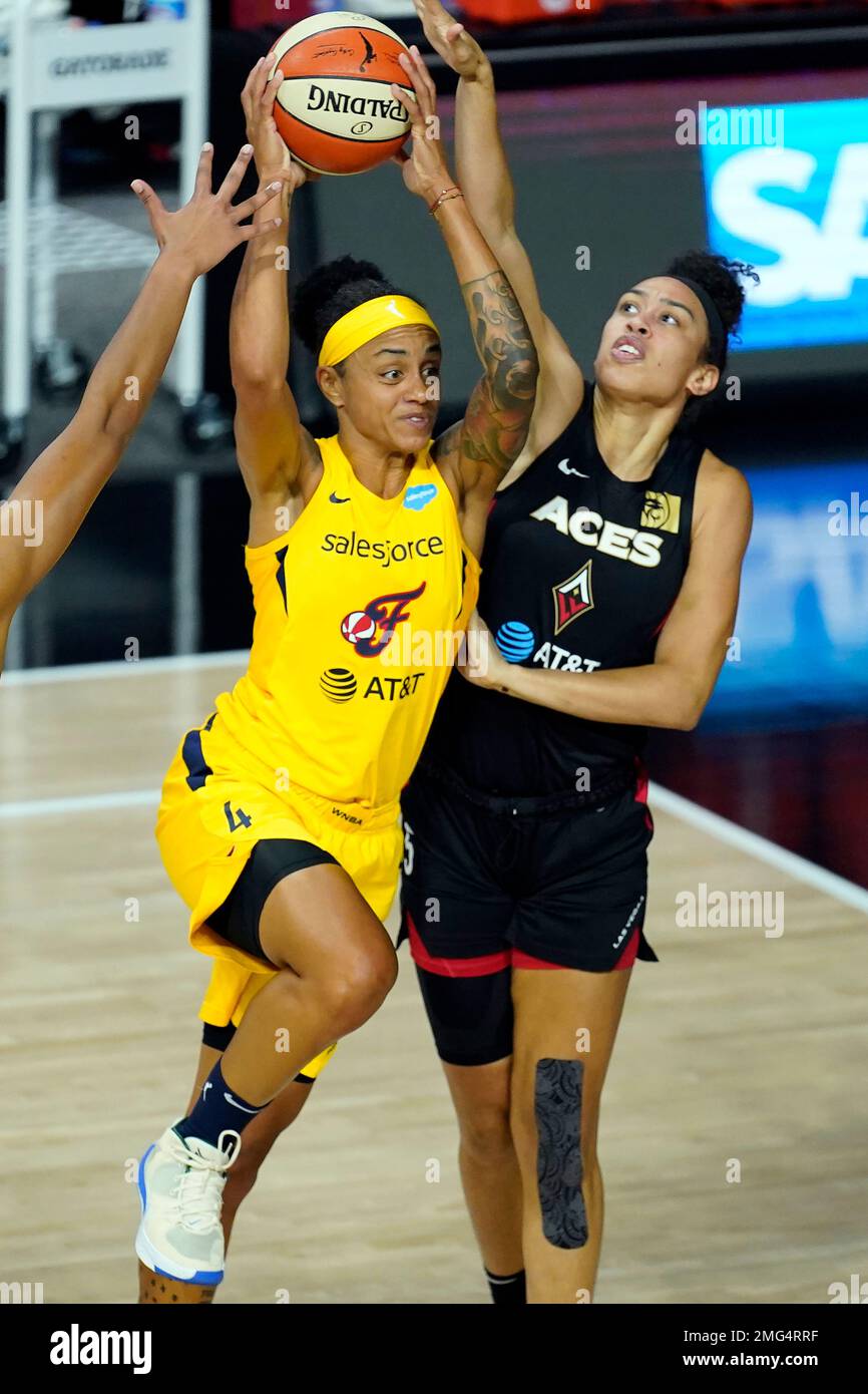 Indiana Fever forward Candice Dupree (4) goes up against Las Vegas Aces ...