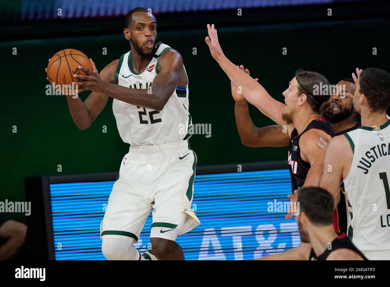 Milwaukee Bucks' Khris Middleton (22) looks for a teammate to pass to ...