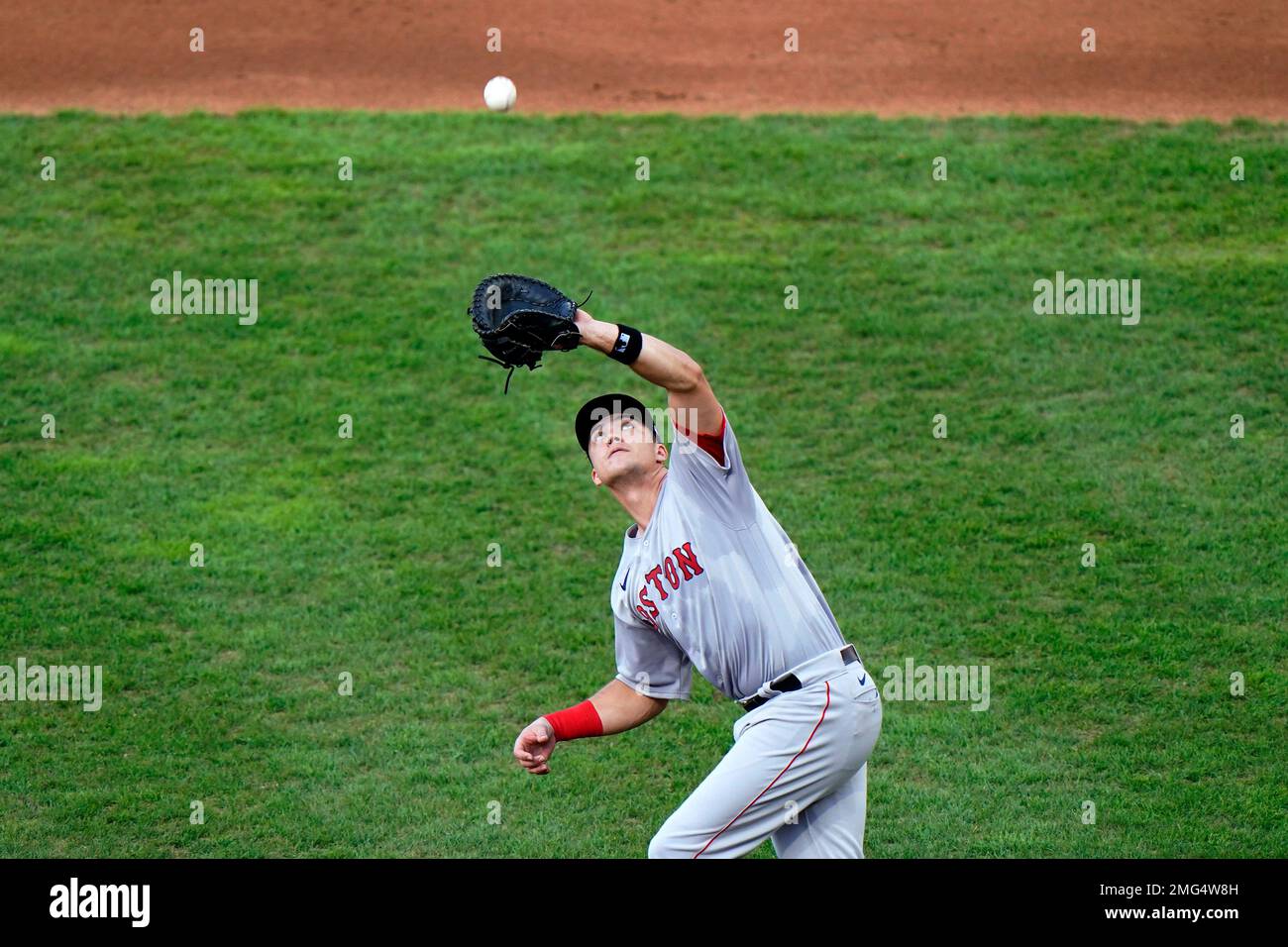 Boston Red Sox first baseman Bobby Dalbec catches a fly out by ...