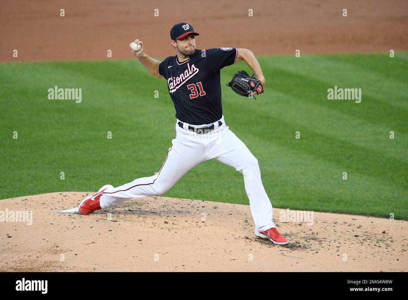 Washington Nationals starting pitcher Max Scherzer delivers a pitch ...