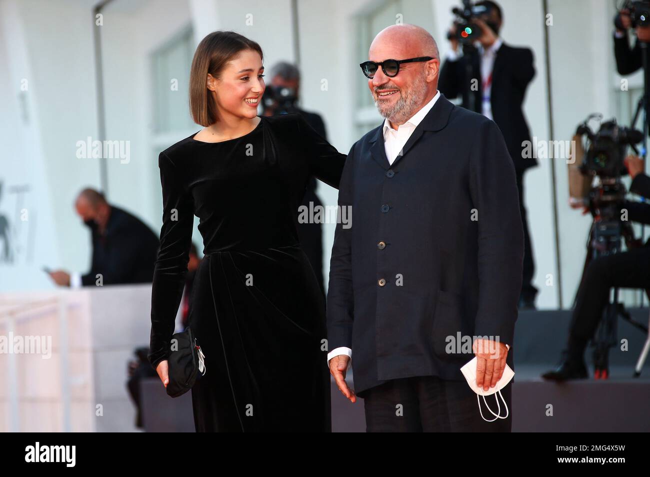 Director Gianfranco Rosi, right, and his daughter Emma Rosi pose for ...
