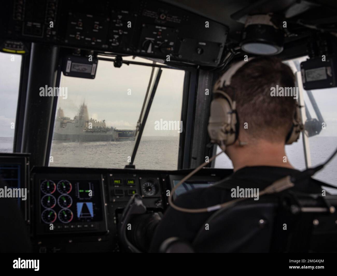 A U.S. Navy Sailor assigned to USS New Orleans (LPD 18), pilots a ...