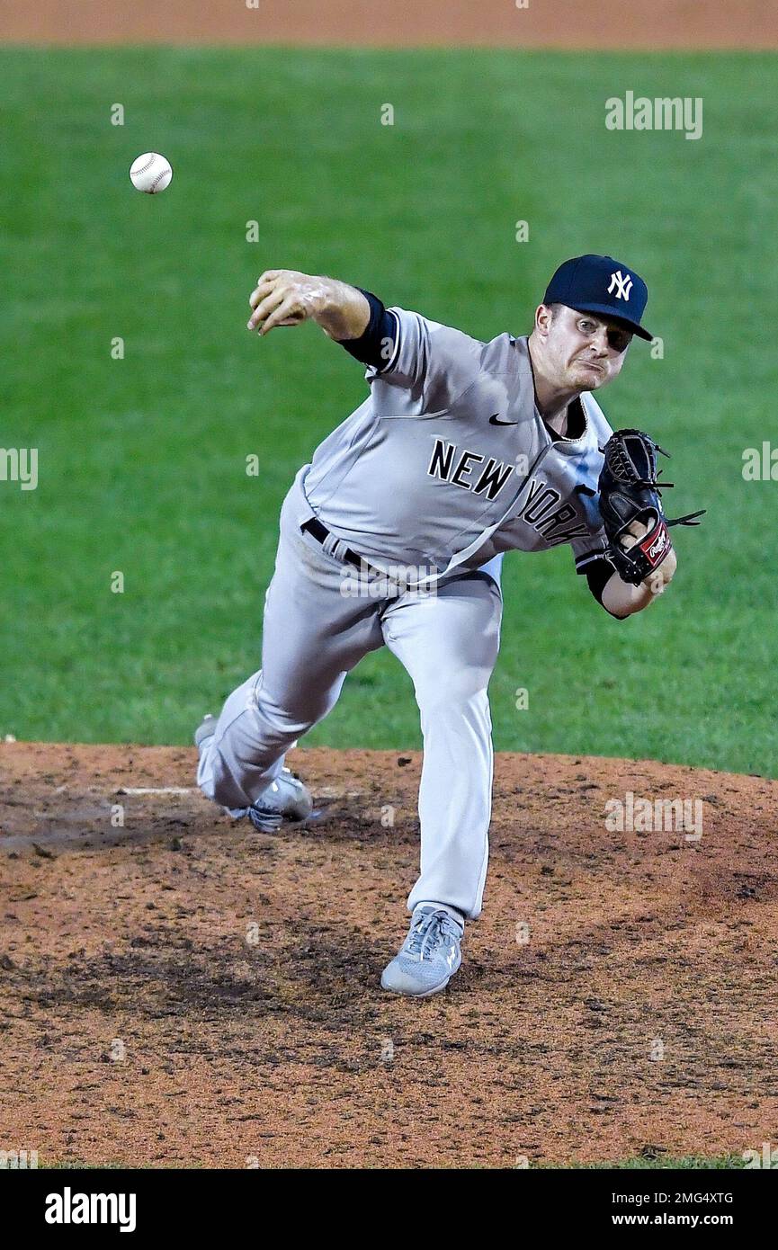 New York Yankees pitcher Clarke Schmidt throws to a Toronto Blue Jays ...