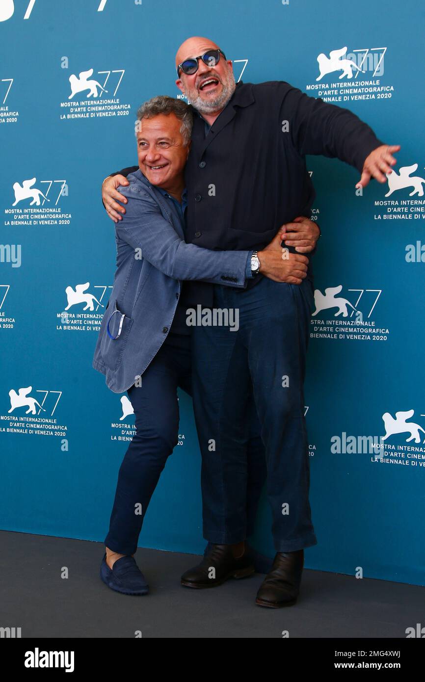 Director Gianfranco Rosi, right, and producer Paolo Del Brocco pose for ...