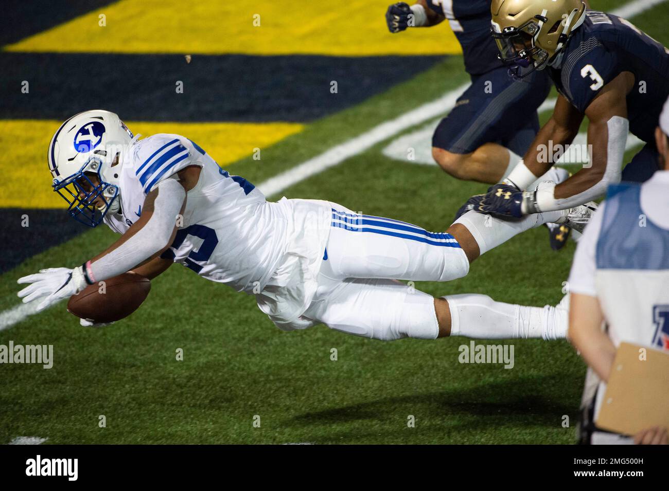 BYU running back Tyler Allgeier dives for a touchdown as Navy defensive ...