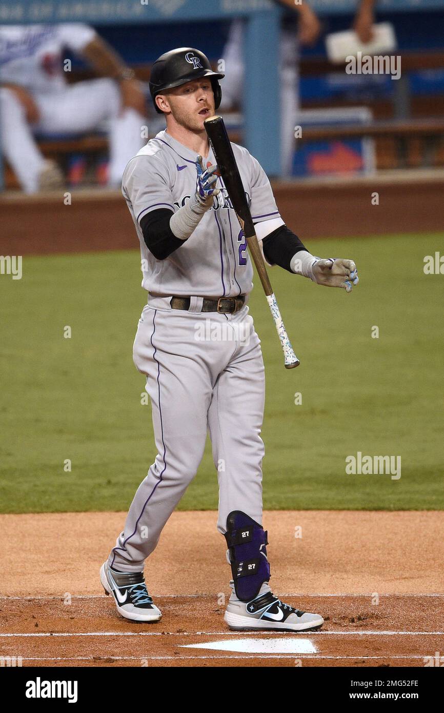 Colorado Rockies' Trevor Story tosses his bat after a strike during the ...