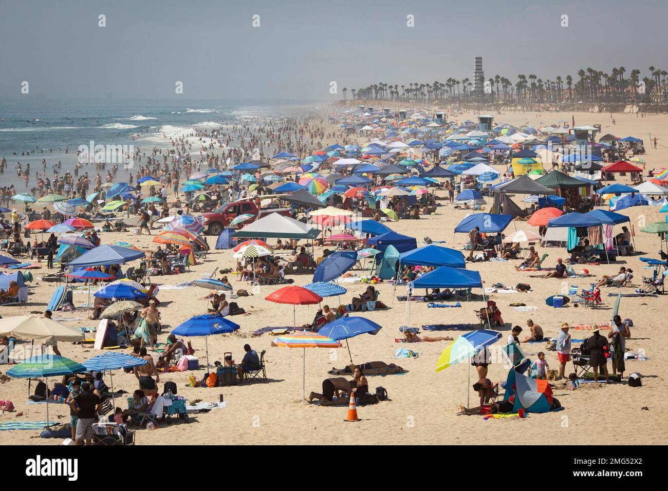 People escape the California heat wave at the beach, Sunday, Sept. 6 ...