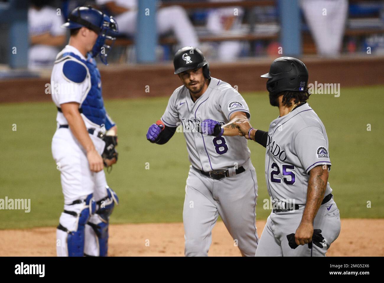 Colorado Rockies' Matt Kemp (25) congratulates Josh Fuentes (8) on his ...