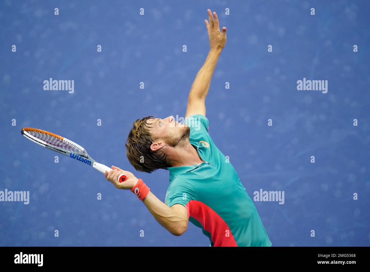 David Goffin, of Belgium, serves to Denis Shapovalov, of Canada, during ...