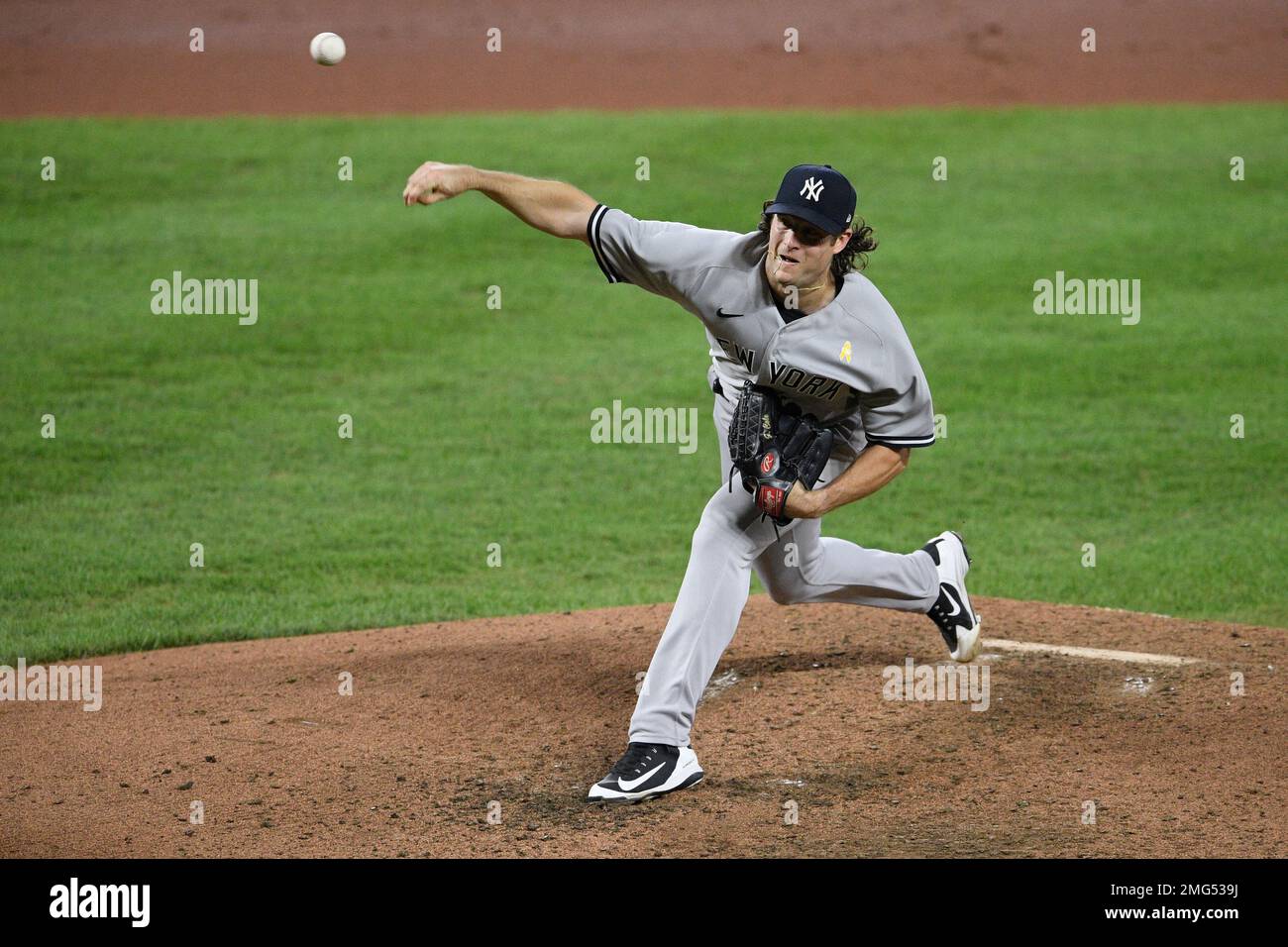 New York Yankees starting pitcher Gerrit Cole delivers a pitch during a ...
