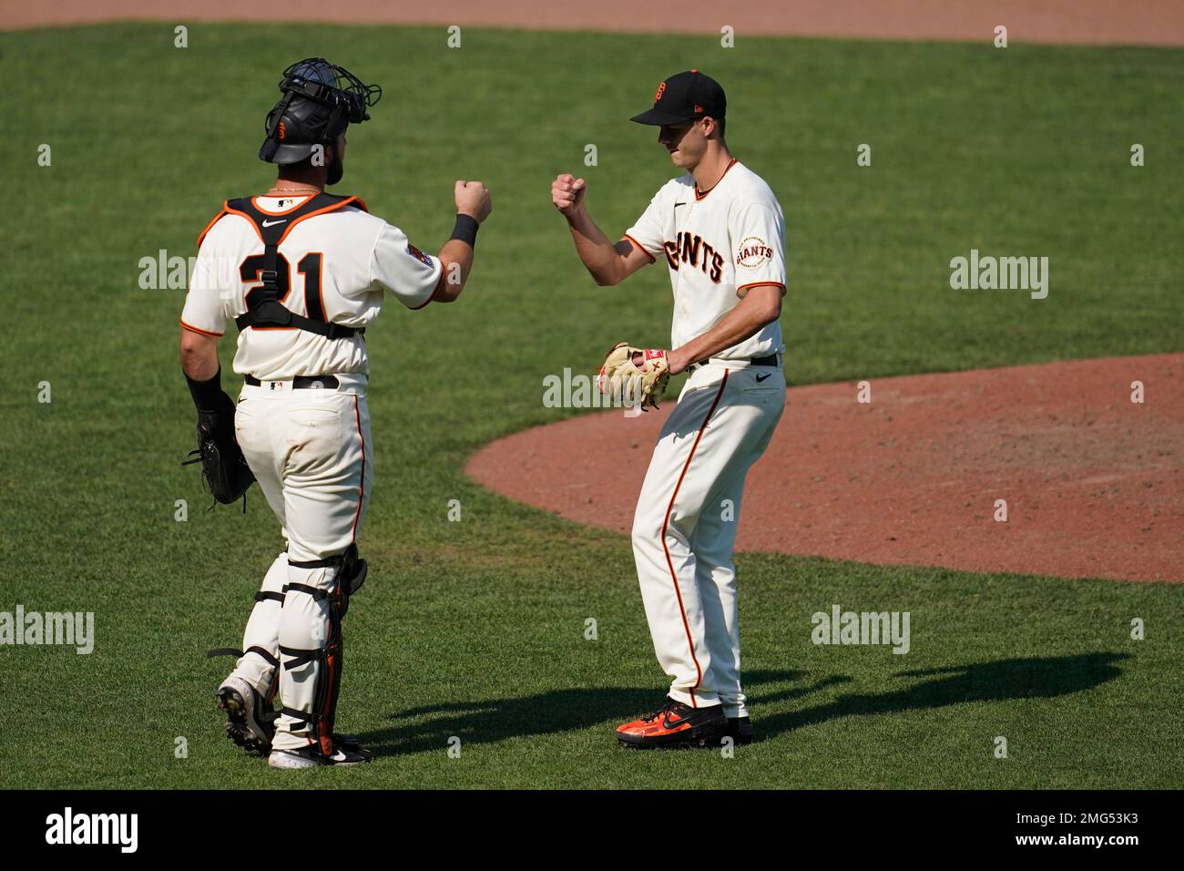San Francisco Giants' catcher Joey Bart (21) and Tyler Rogers celebrate ...