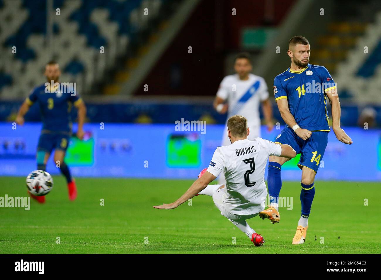Valon Berisha of Kosovo, right, is challenged by Michalis Bakakis of ...