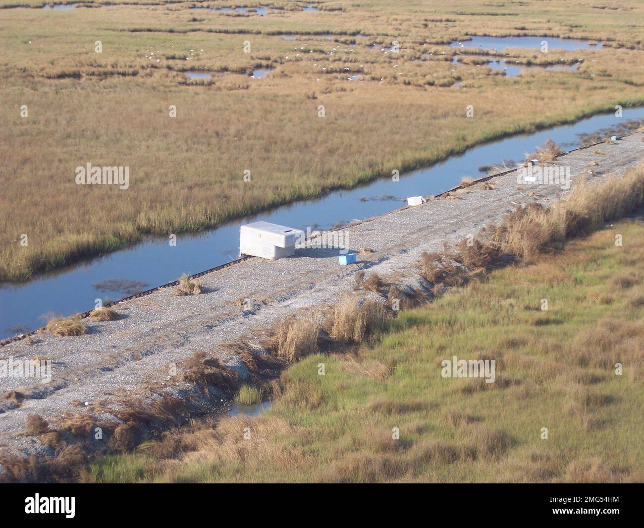 Aftermath - Miscellaneous - 26-HK-46-63. storage unit and other debris ...