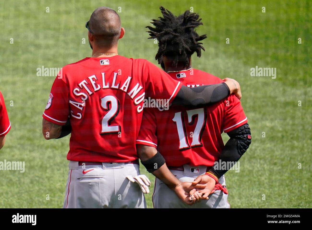 Cincinnati Reds' Nick Castellanos stands with Brian Goodwin during the ...