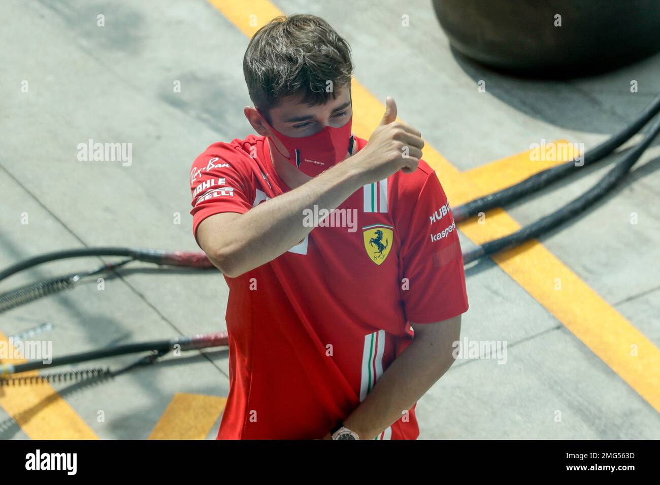 Ferrari driver Charles Leclerc of Monaco gives the thumb-up sign in the ...